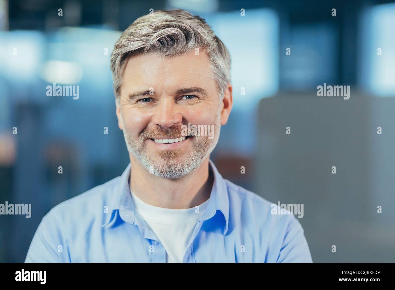 Close-up photo of male businessman, portrait of gray-haired experienced ...