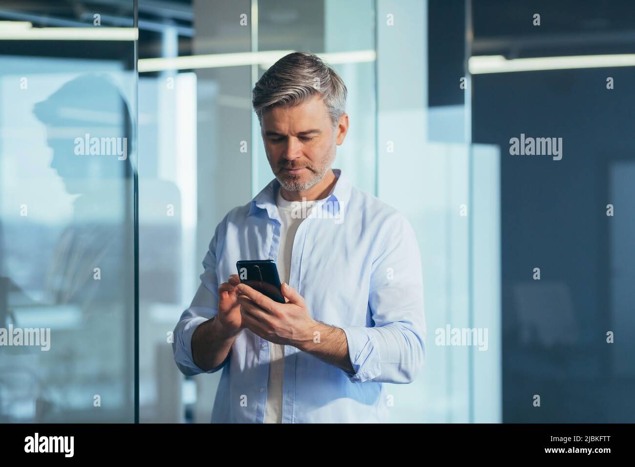 Senior boss business man in modern office, portrait of business owner ...