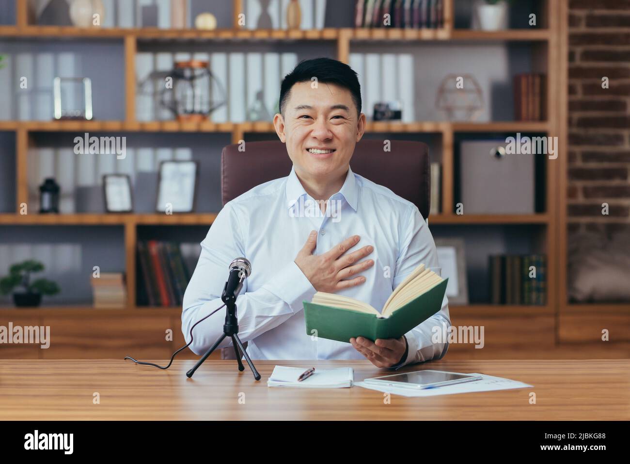Asian preacher reads bible hi-res stock photography and images - Alamy