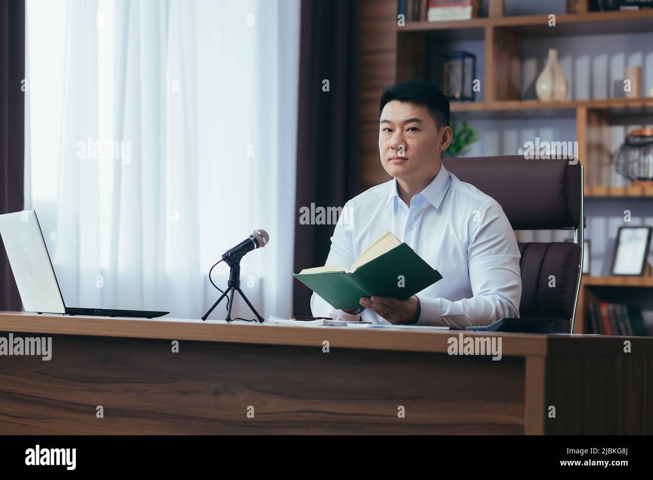 Asian preacher reads bible hi-res stock photography and images - Alamy