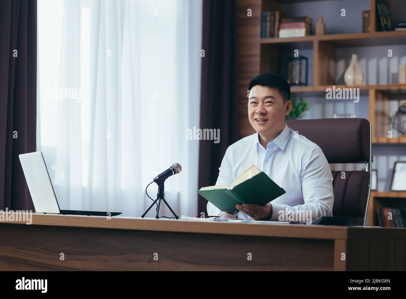 Asian preacher reads bible hi-res stock photography and images - Alamy
