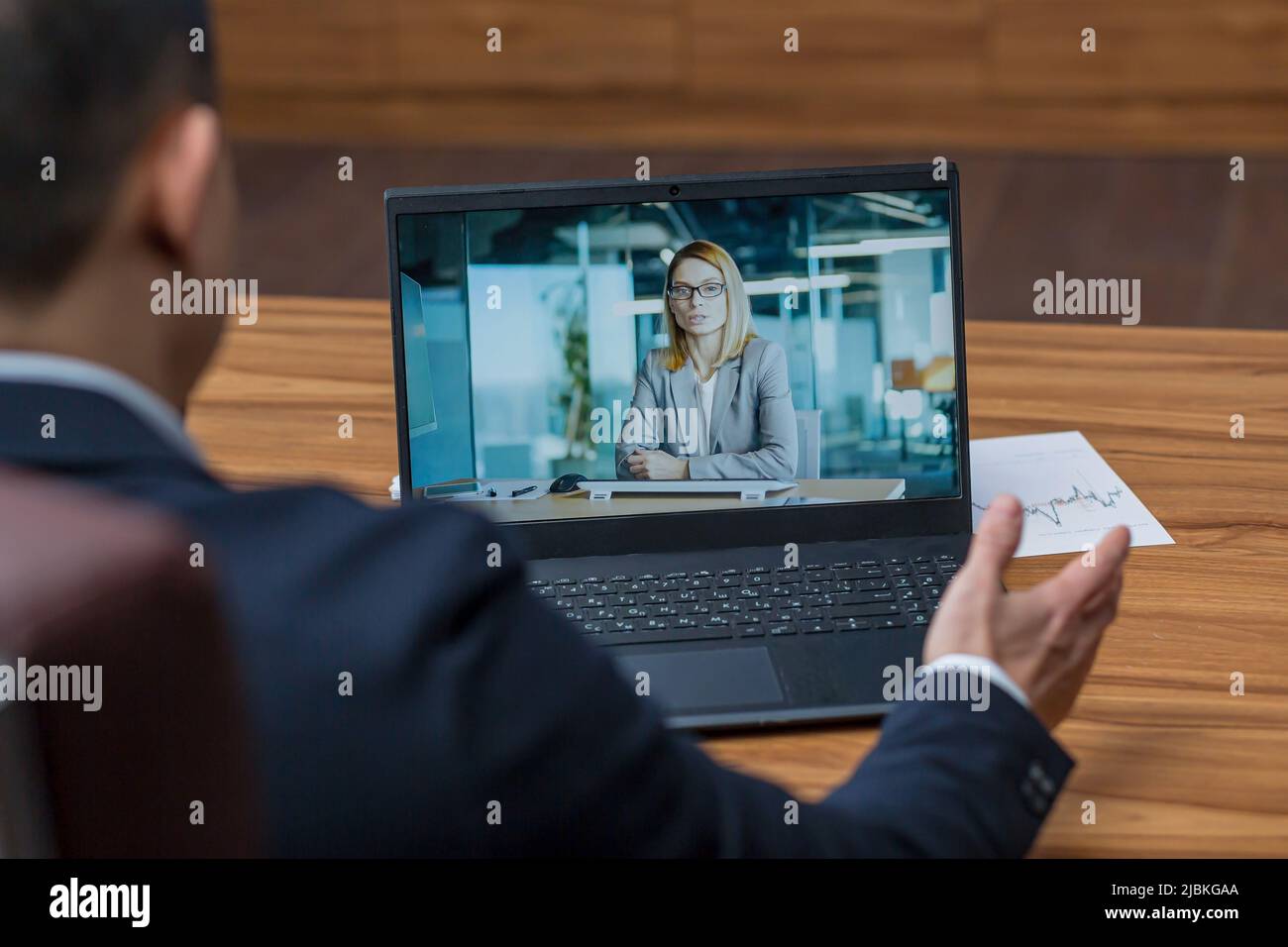 Male asian boss talking on video call with colleagues, online rally ...