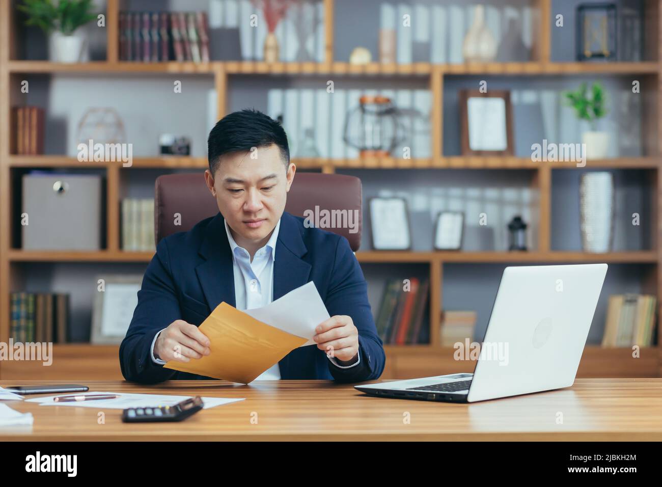 Young successful man asian office worker, director, banker, businessman ...