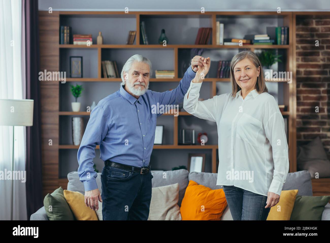 Happy cheerful senior married couple having fun at home. older family ...