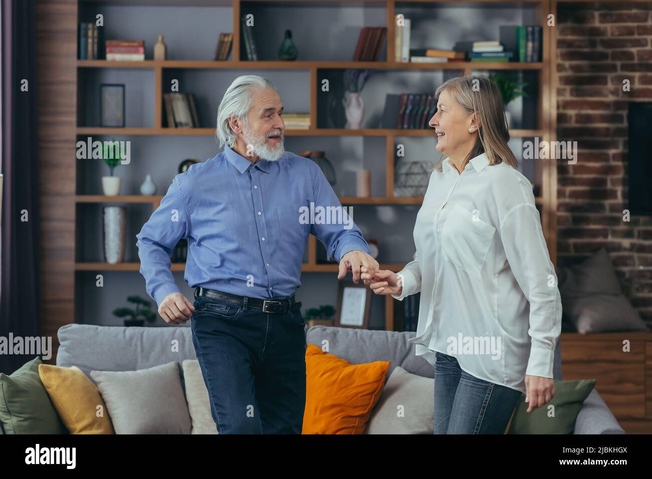 Happy cheerful senior married couple having fun at home. older family ...