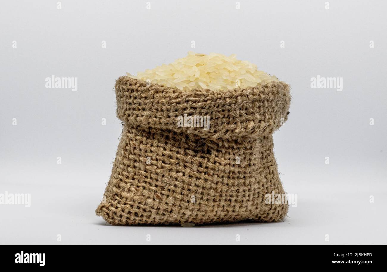 Rice in a jute bag Stock Photo - Alamy
