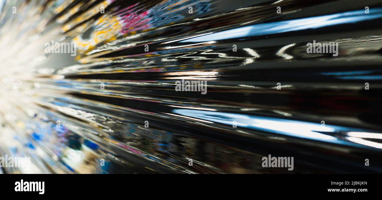 Black plastic wrap background. Crumpled wrinkled plastic cellophane ...