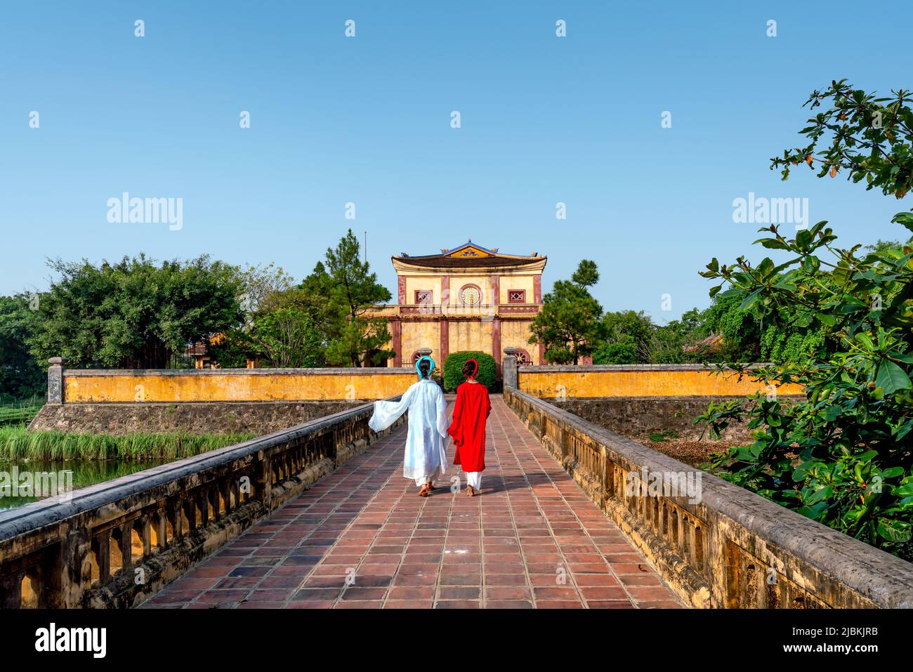 Ancient Museum, Hue City, Vietnam - April 27, 2022: Model wears a ... Ancient Museum, Hue City, Vietnam - April 27, 2022: Model wears a ...
