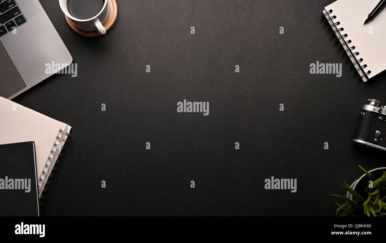 Modern black dark workspace background with copy space for display your ...