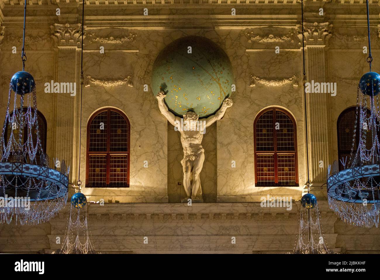 Atlas statue inside Royal Palace of Amsterdam in Dam Square Stock Photo ...