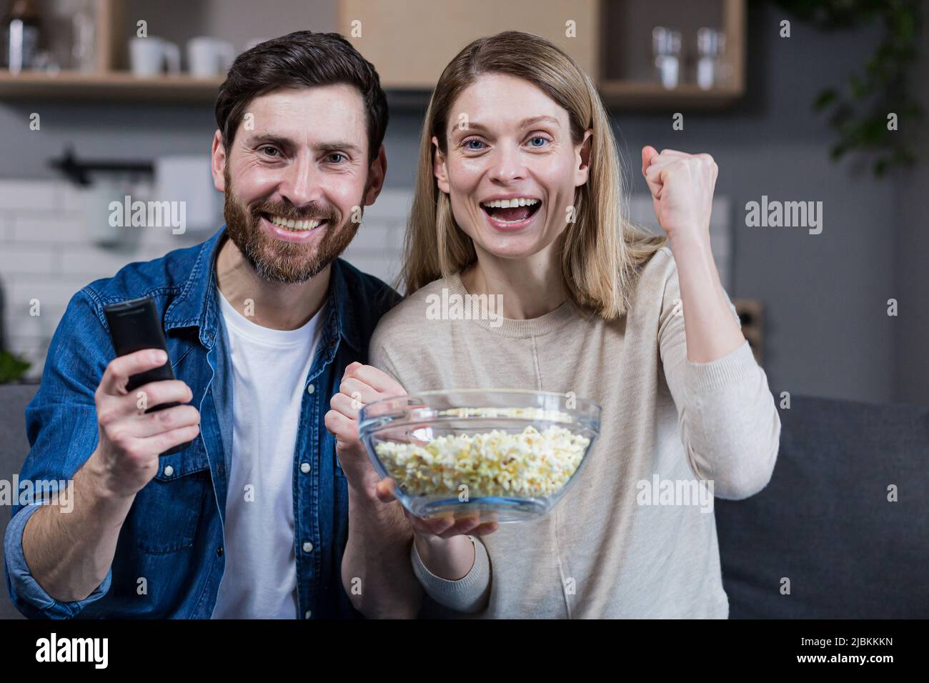 Photo of close couple man and woman together at home having fun and ...