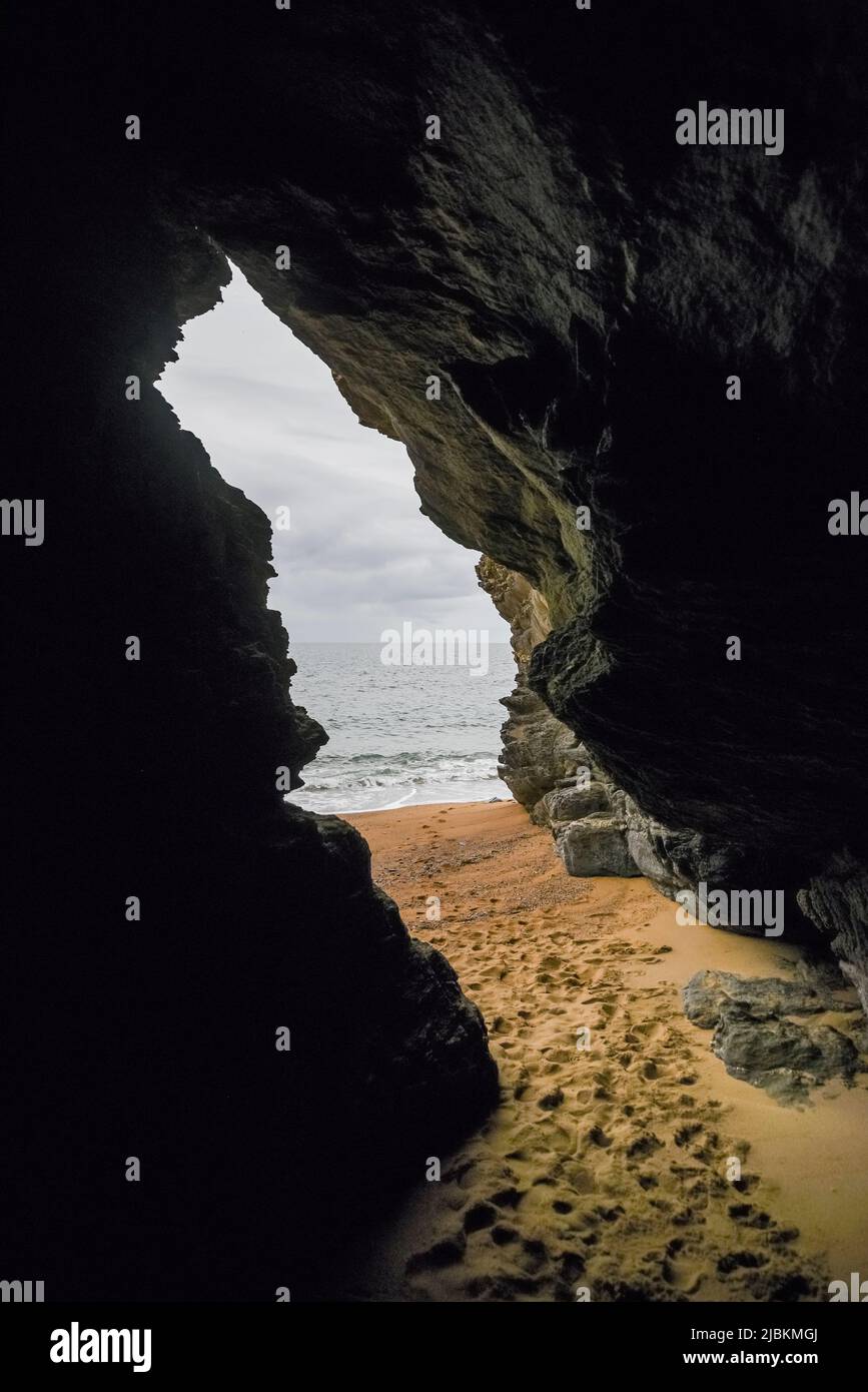 Cave by the ocean, exit from the cave from the inside Stock Photo - Alamy
