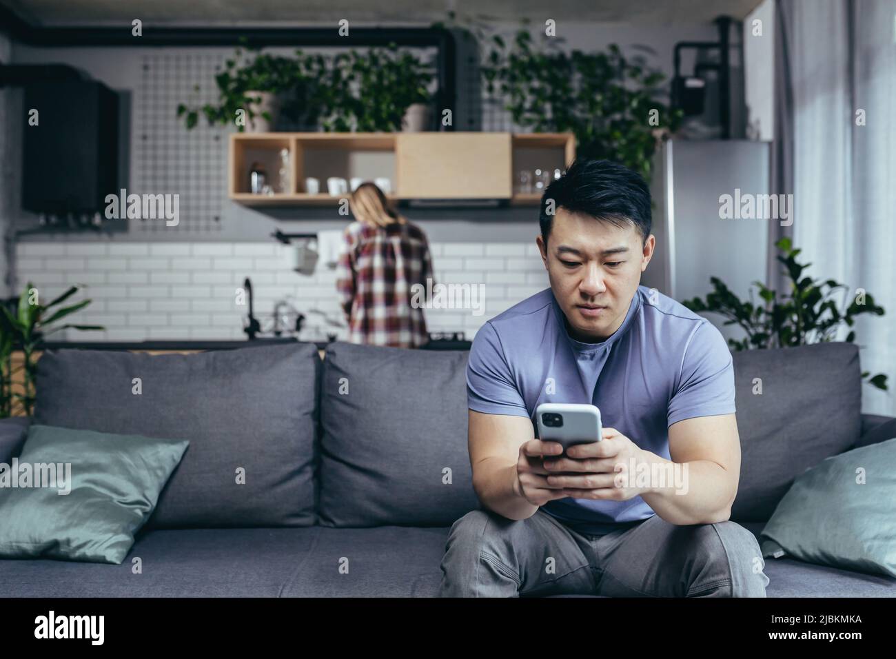 Suspicious man on phone hi-res stock photography and images - Alamy