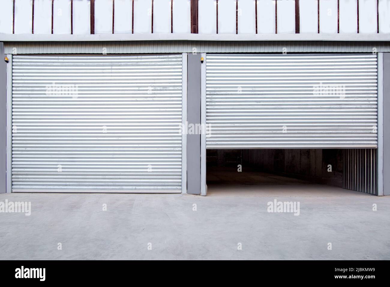 2 gray iron shutter door? of garage and industrial building warehouse ...