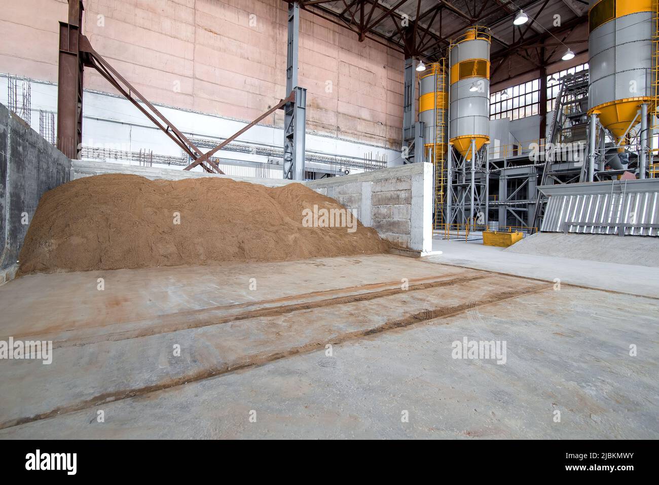 pile of dry river sand in storage warehouse in factory for production ...