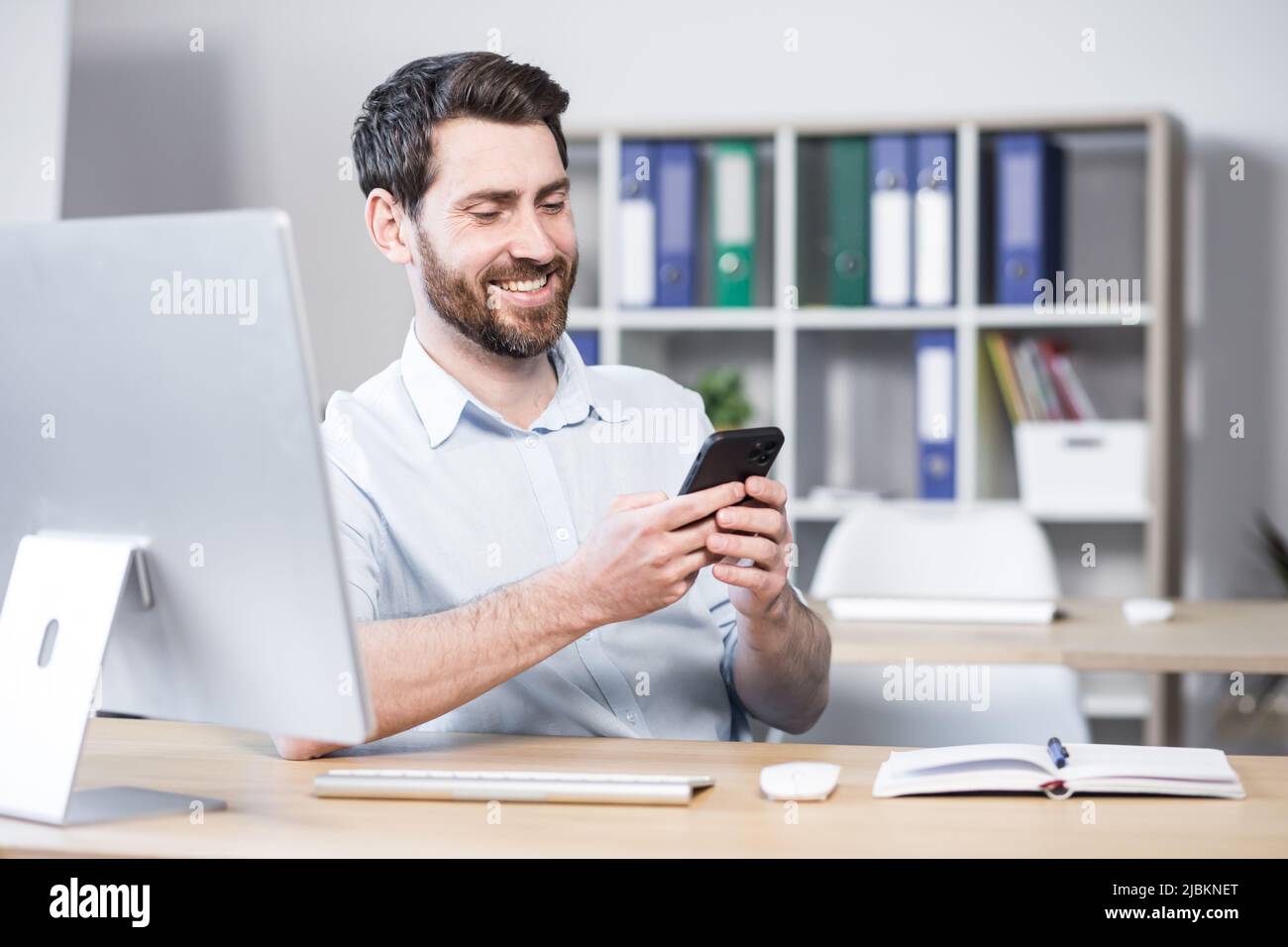 Close up photo. Happy and joyful office worker, director, manager ...