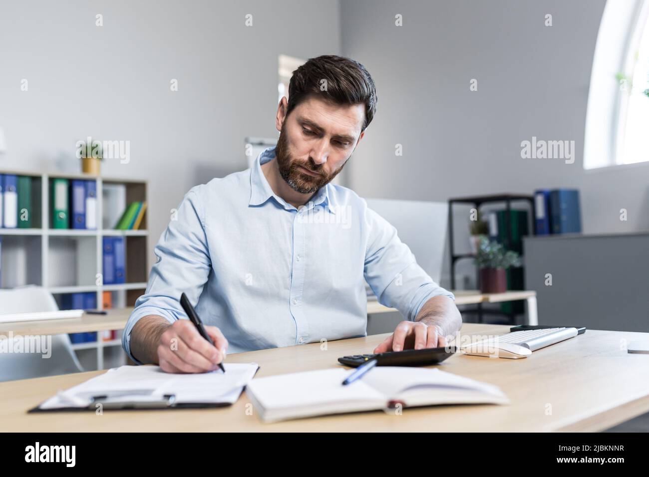 Reviewing reports hi-res stock photography and images - Alamy