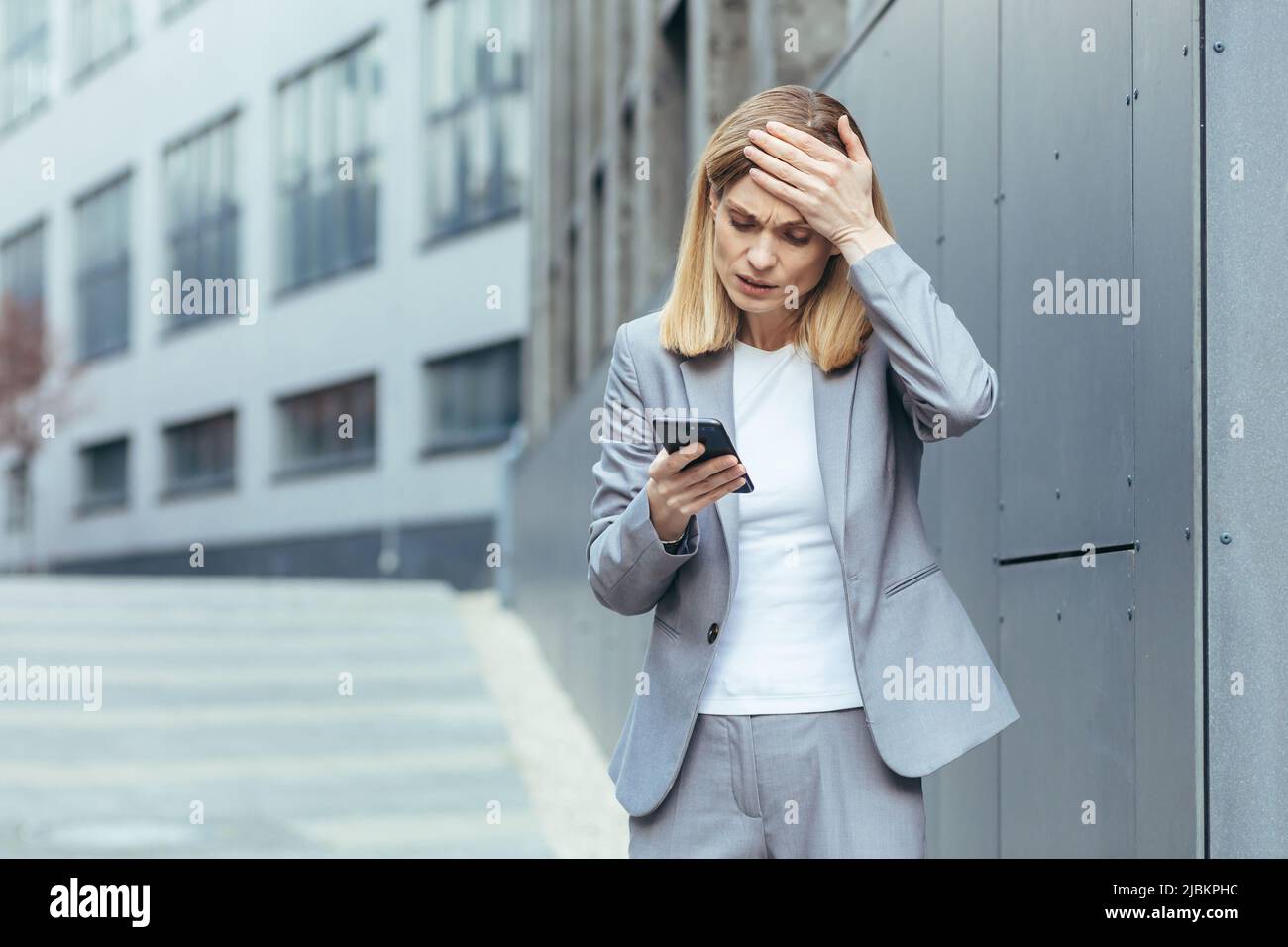 Middle aged business woman, patient has severe headache, businesswoman ...