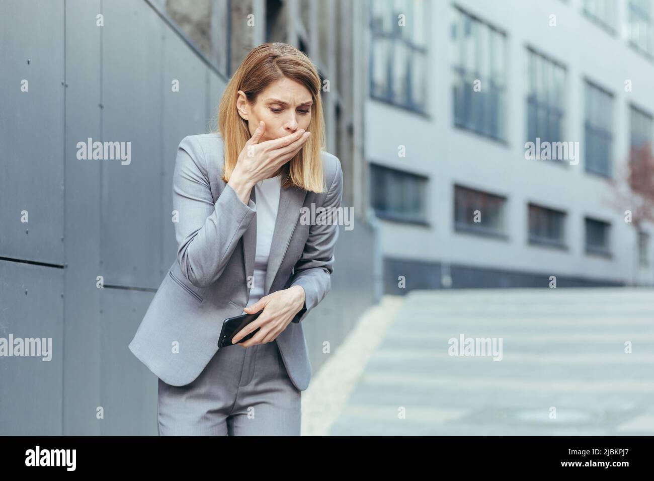 Woman near office nausea and vomiting reflex, sick businesswoman Stock ...