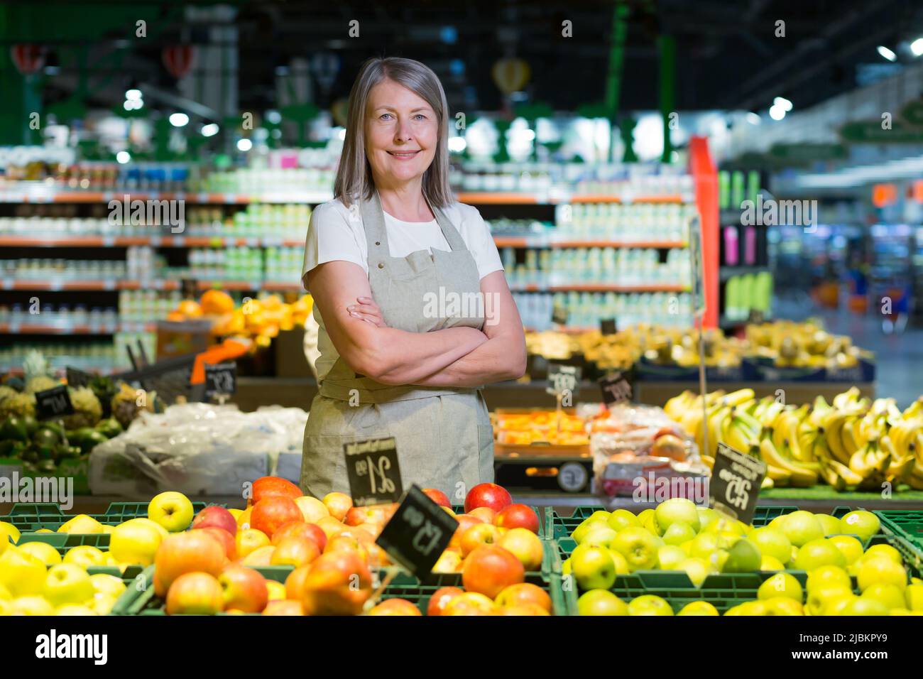 Portrait of senior woman manager of grocery store, supermarket ...