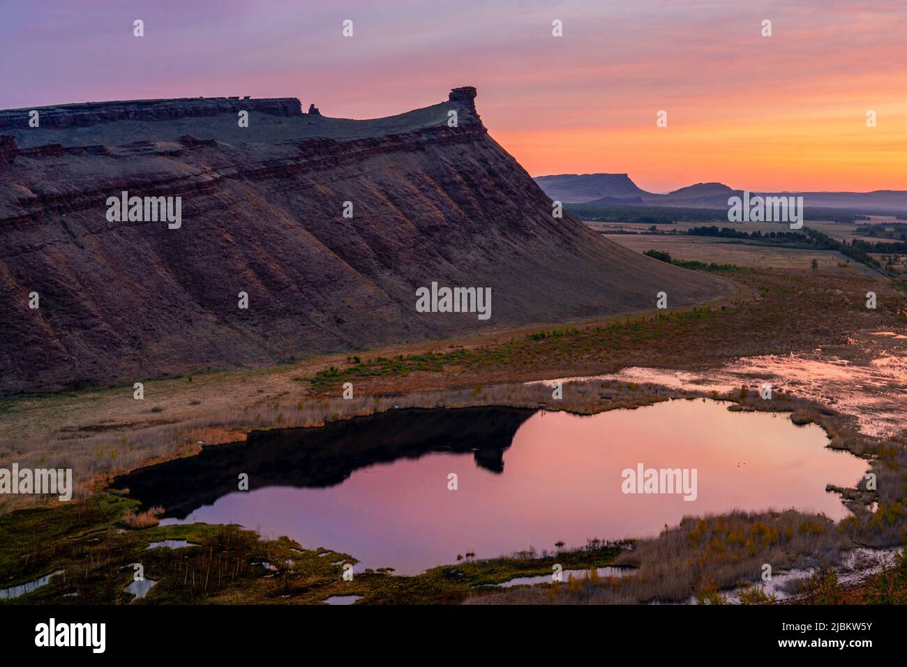 Chest butte or First Sunduk against blue sky. Sunduki mountain range ...