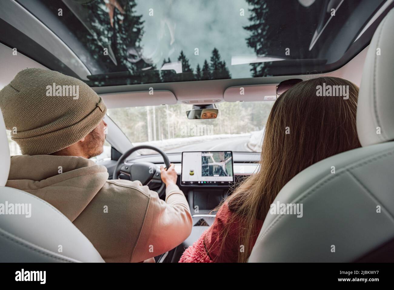 Back view woman driving car hi-res stock photography and images - Alamy