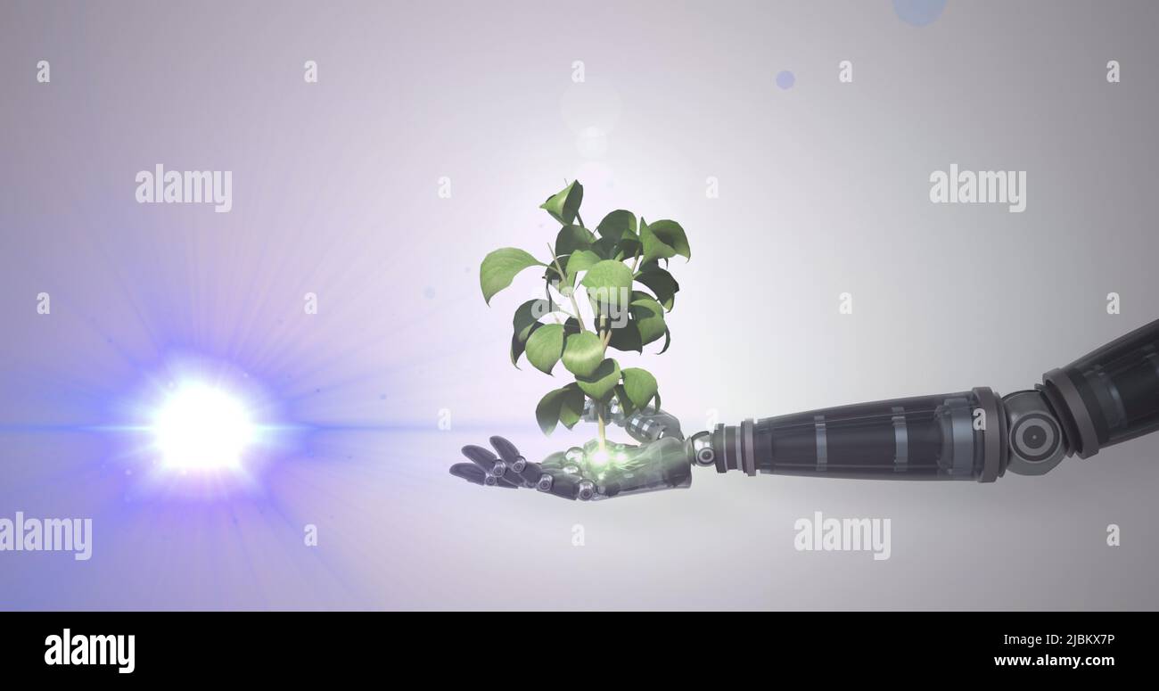 Image of growing plant in hand of extended robot arm with moving light ...