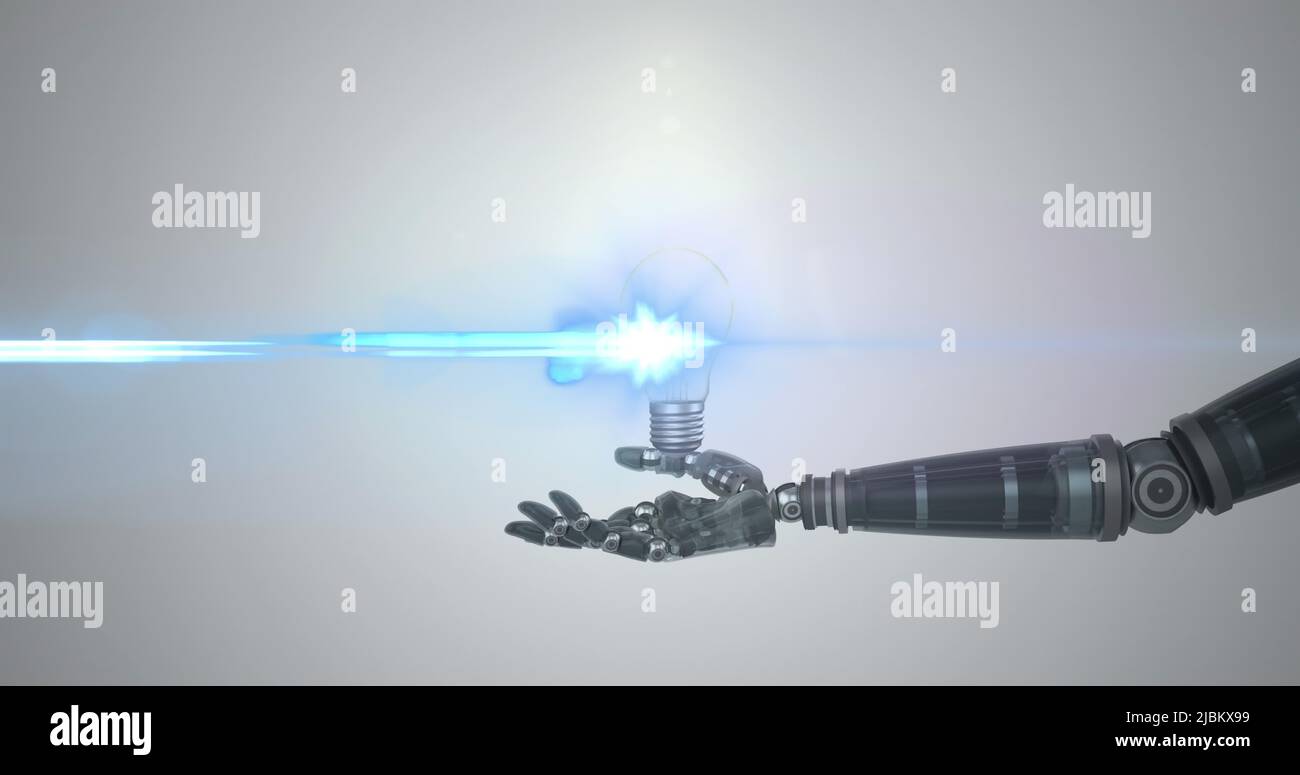 Image of illuminated light bulb over hand of robot arm, with moving ...