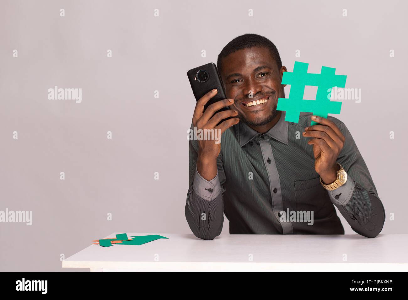Black man holding campaign sign hi-res stock photography and images - Alamy
