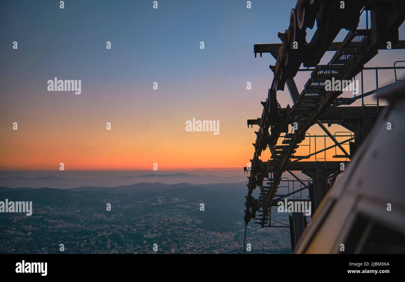 Closeup, Modular cabins cable car against the bright sky, clouds and ...