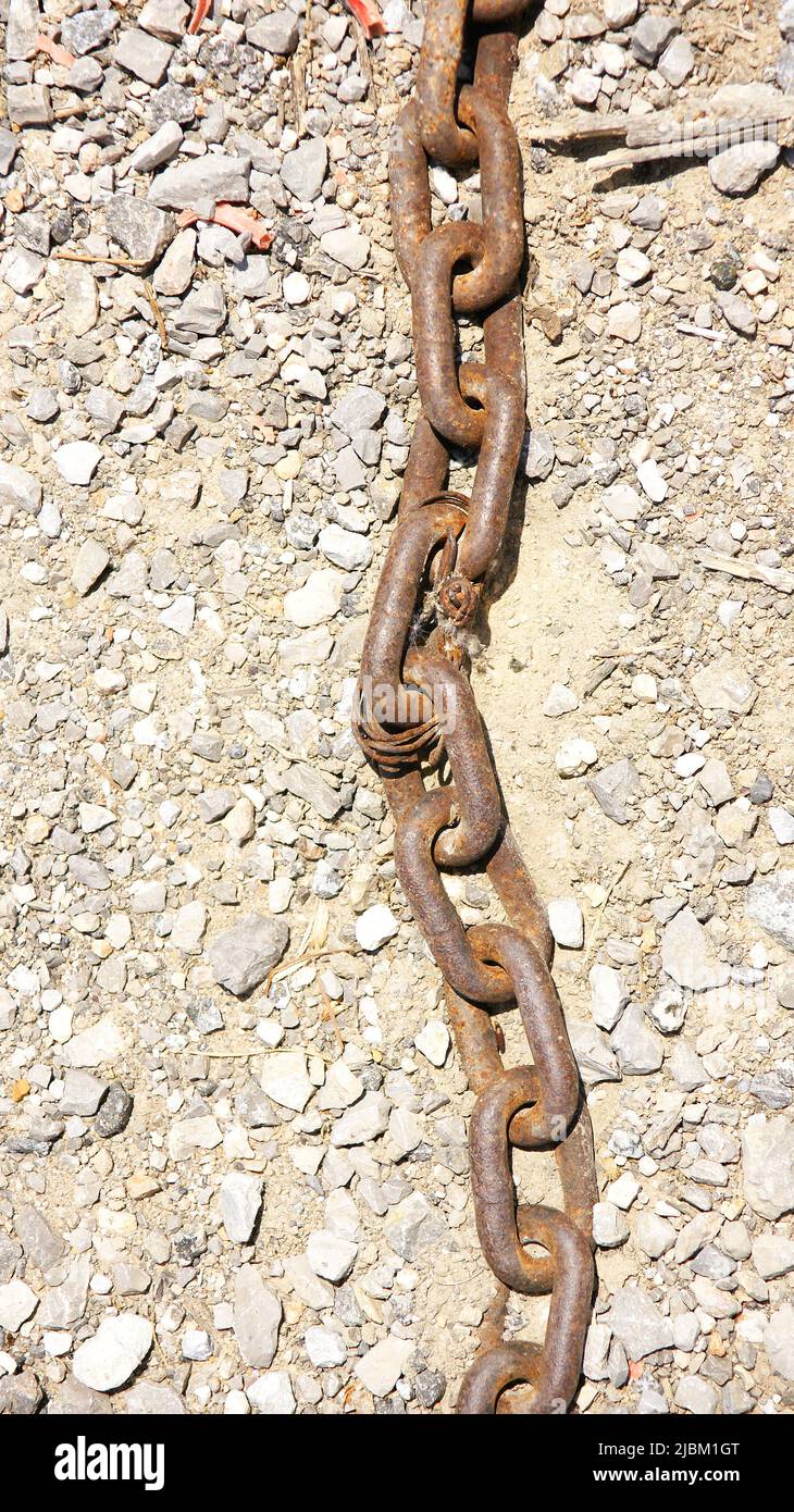 Chain with padlock on a fence of a building site in Barcelona ...