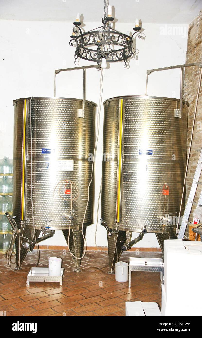 Stainless steel wine containers in a Montepulciano winery Stock Photo ...