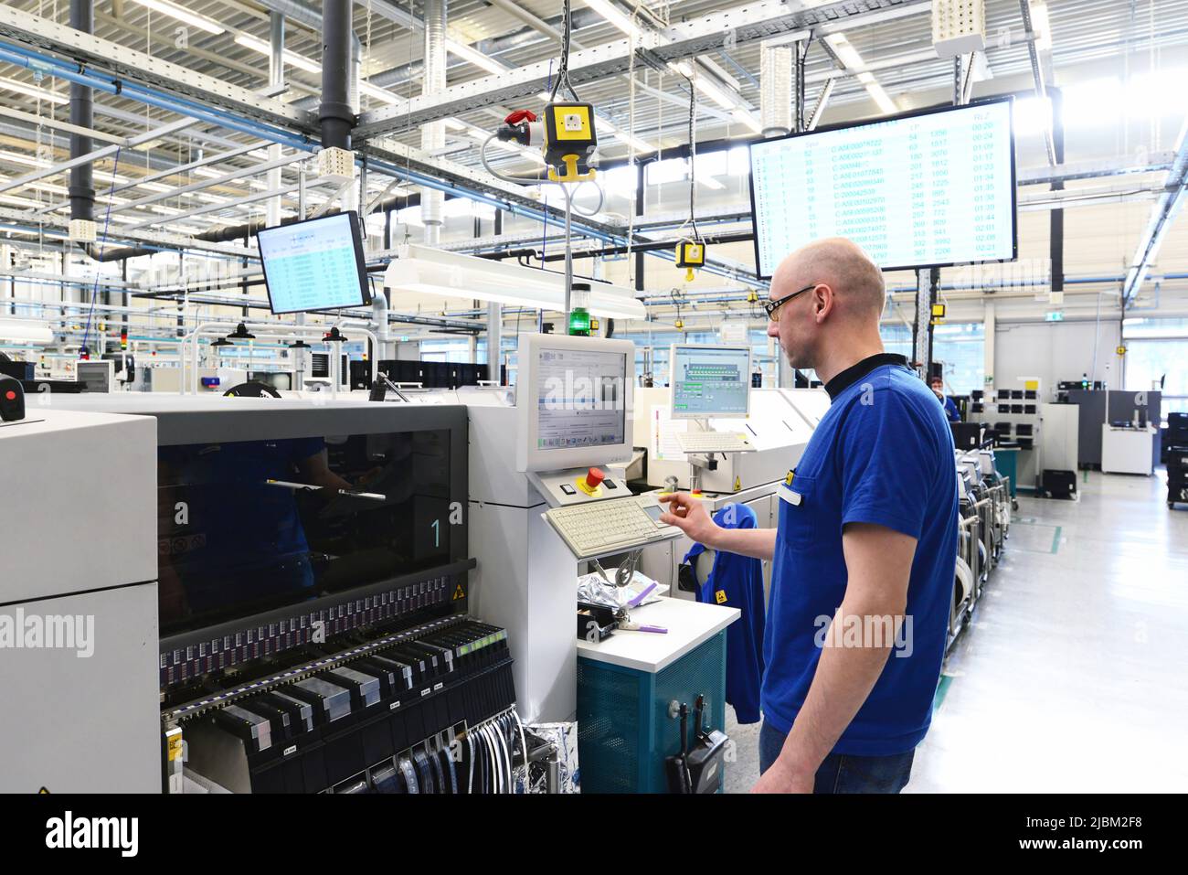 production and assembly of microelectronics in a hi-tech factory - man ...