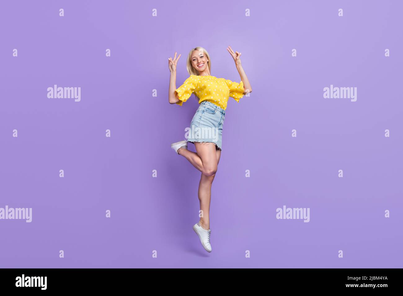 Full size photo of cheerful carefree jumping girl meet friends say ...