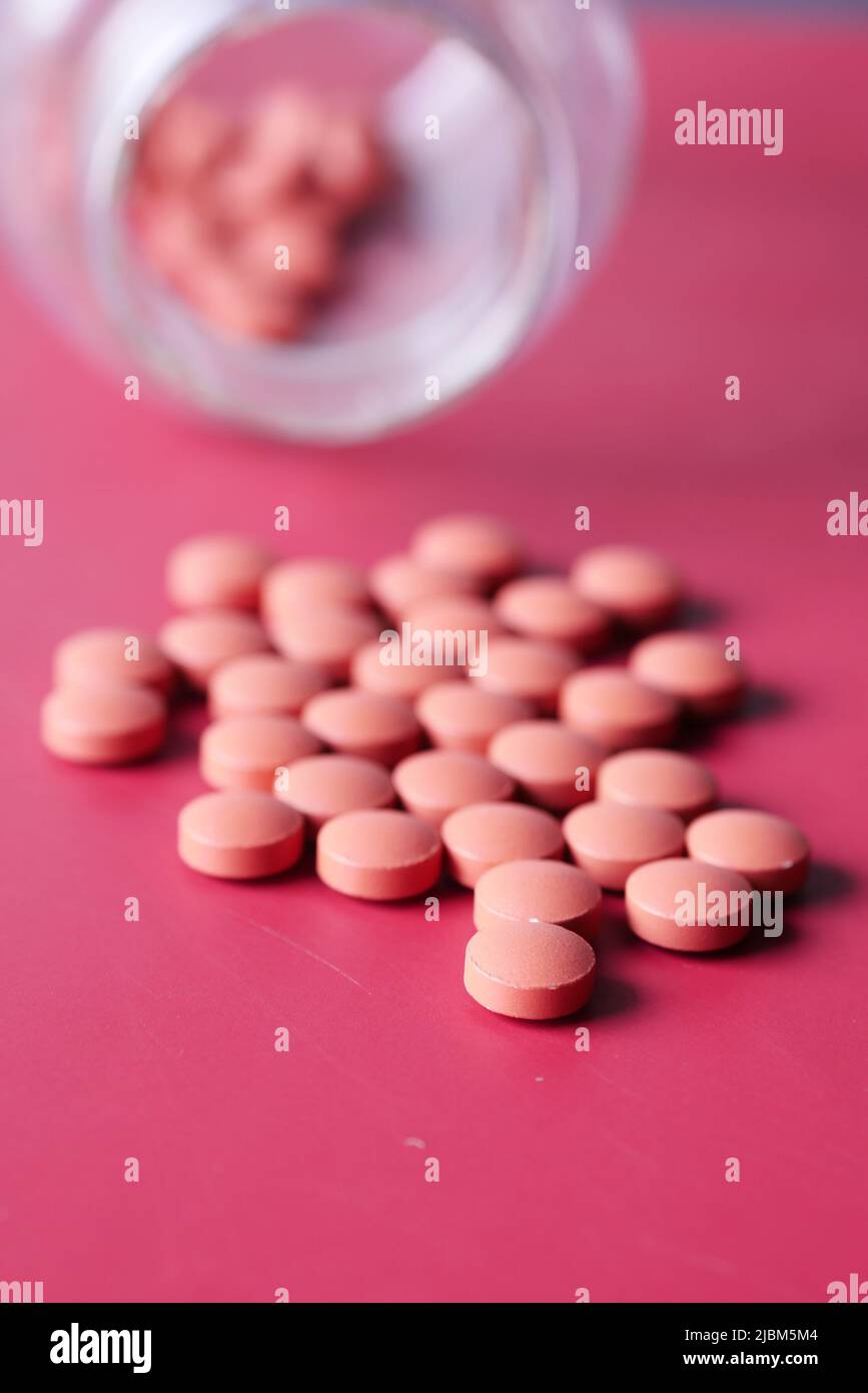 Pain killer spilling form container hi-res stock photography and images ...