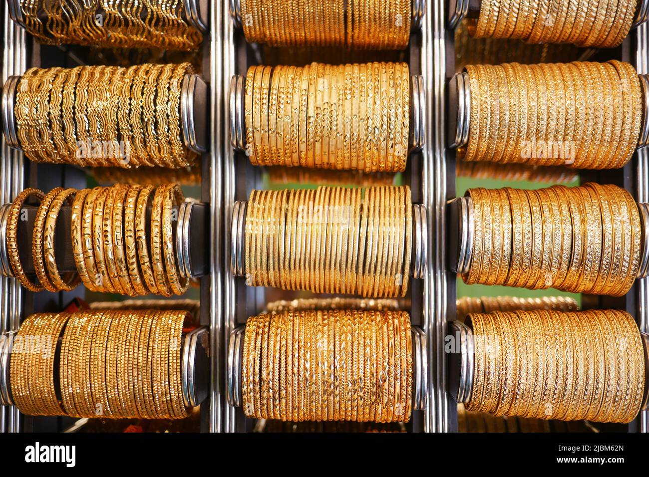 Golden color bangles display hi-res stock photography and images - Alamy