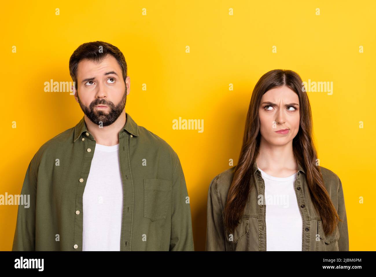 Photo of two minded focused people look interested empty space isolated ...
