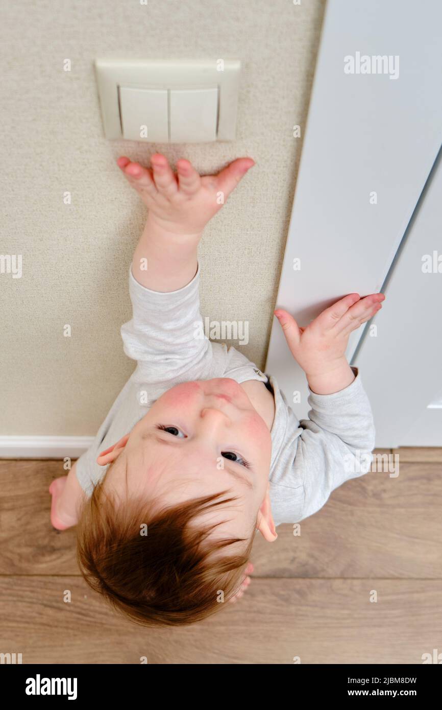 Child switch on lamp hi-res stock photography and images - Alamy