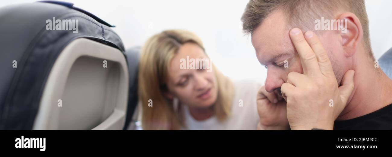 Man and woman flying on holiday Stock Photo - Alamy