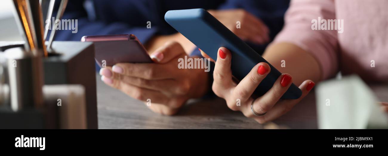People hold mobile phones in hands Stock Photo - Alamy