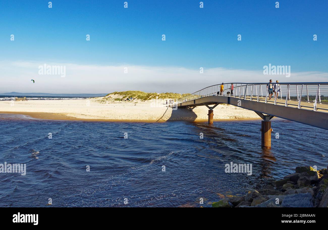 LOSSIEMOUTH MORAY SCOTLAND PEOPLE CROSSING THE NEW BRIDGE OVER THE ...