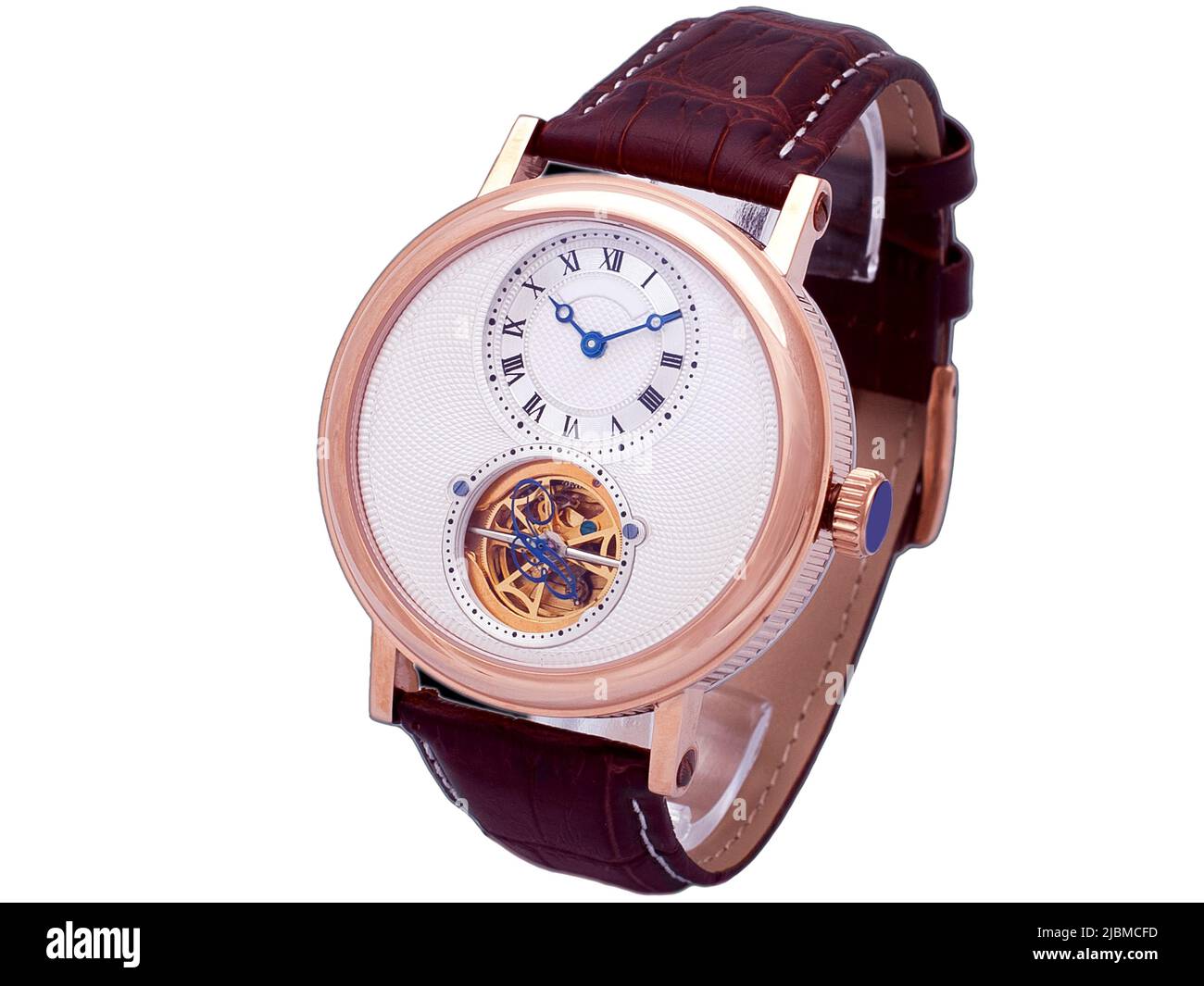 gold wrist watch with a textured dial and mechanism details with gears ...