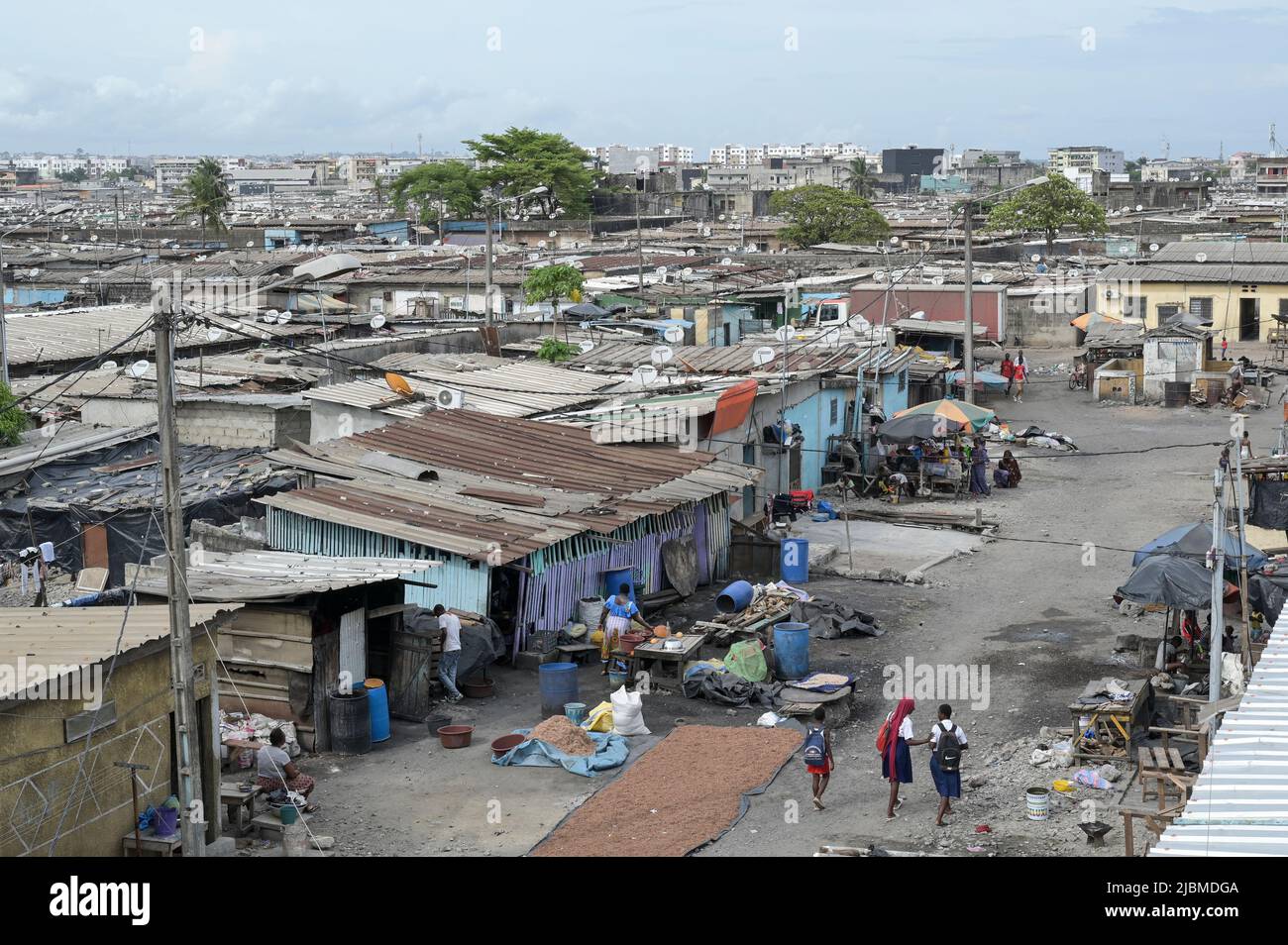 IVORY COAST, Abidjan, Koumassi-Remblais, slum Divo, satellite antenna ...