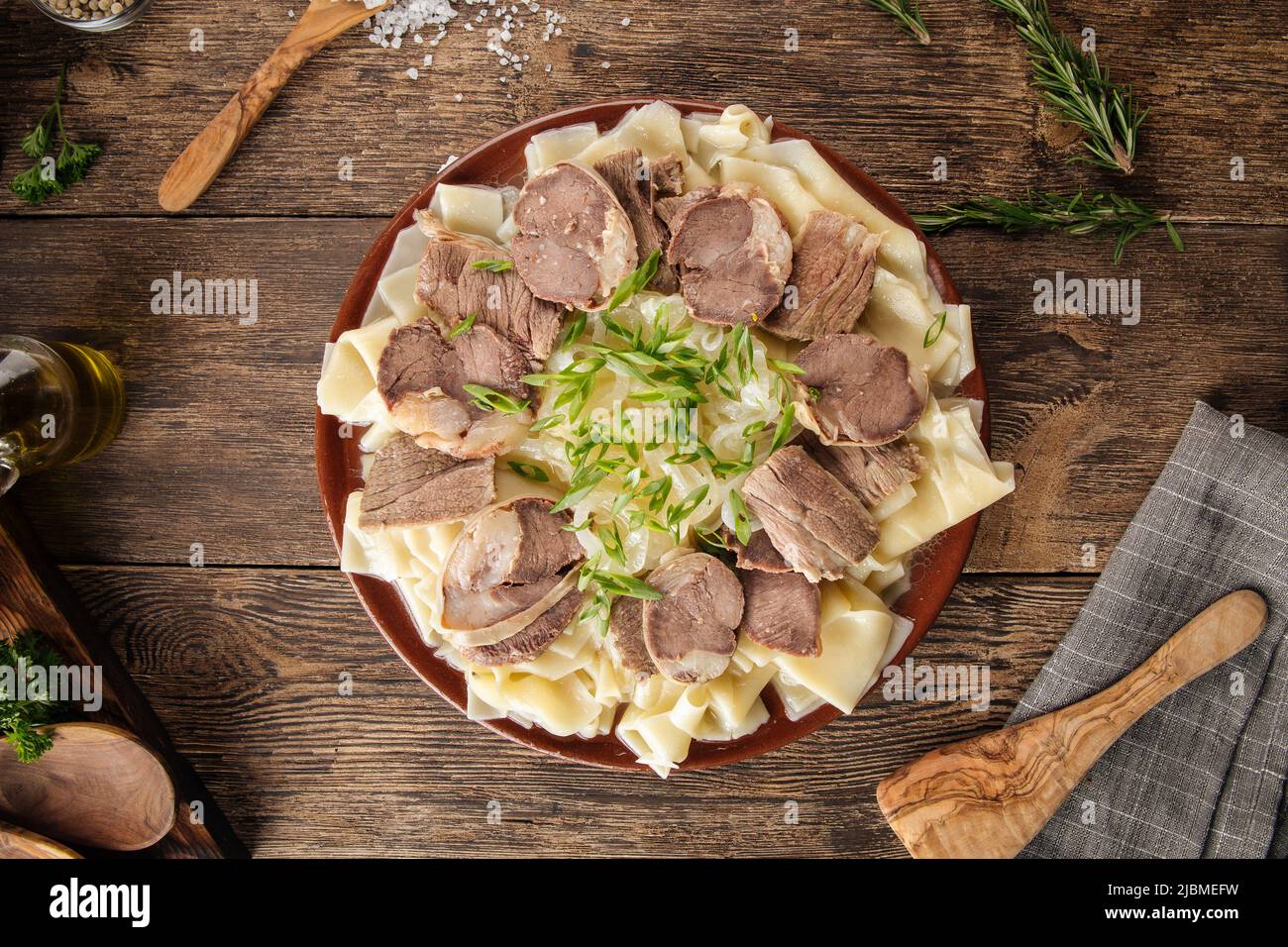 Kazakh national dish beshbarmak with horse meat Stock Photo - Alamy Kazakh national dish beshbarmak with horse meat Stock Photo - Alamy