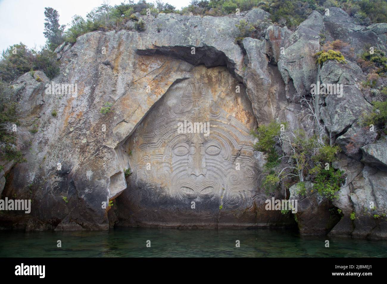 Mine Bay Maori Rock Carvings at Lake Taupo, New Zealand Stock Photo - Alamy