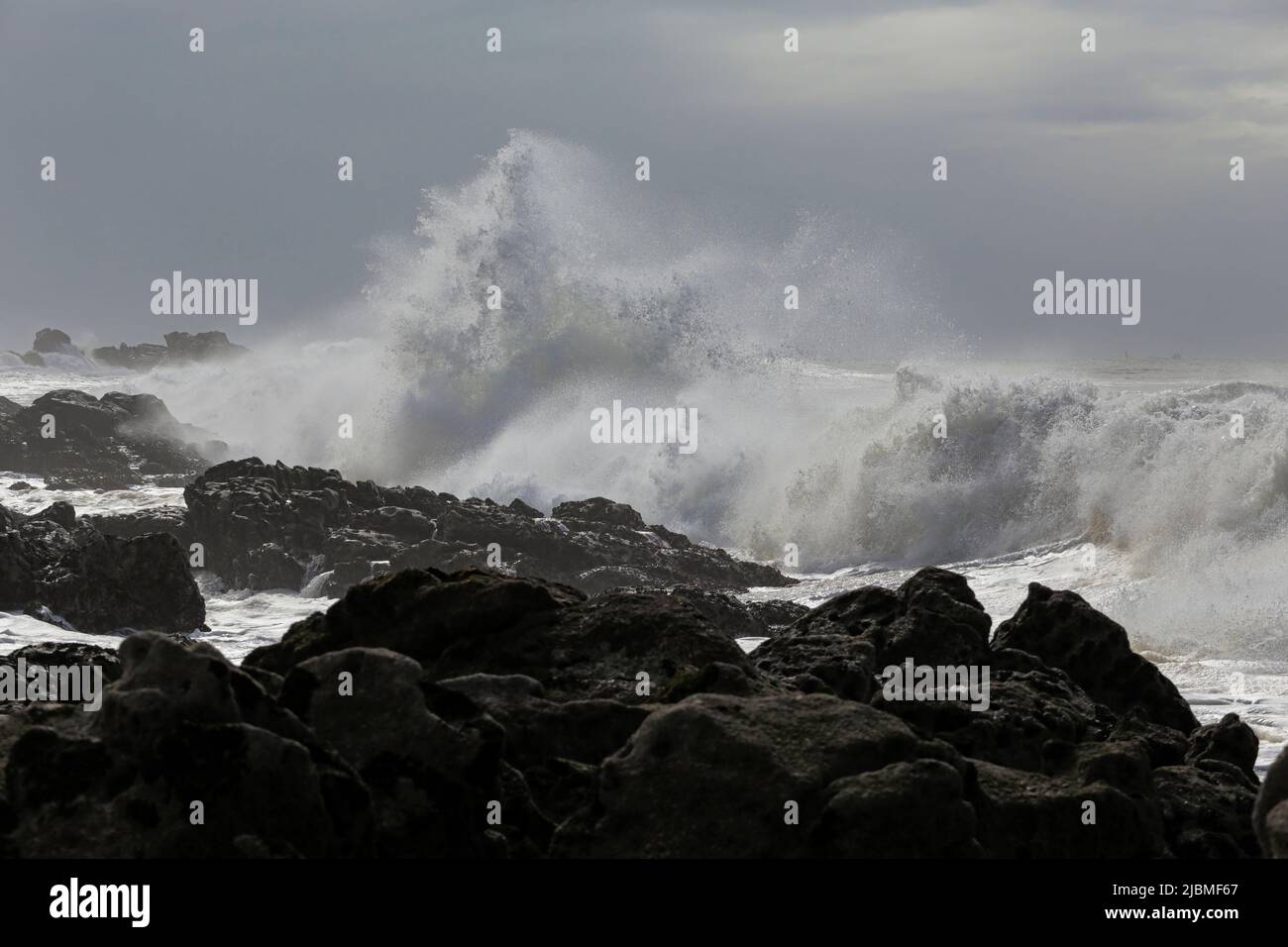 Big stormy wave splash. Northern portuguese rocky coast Stock Photo - Alamy