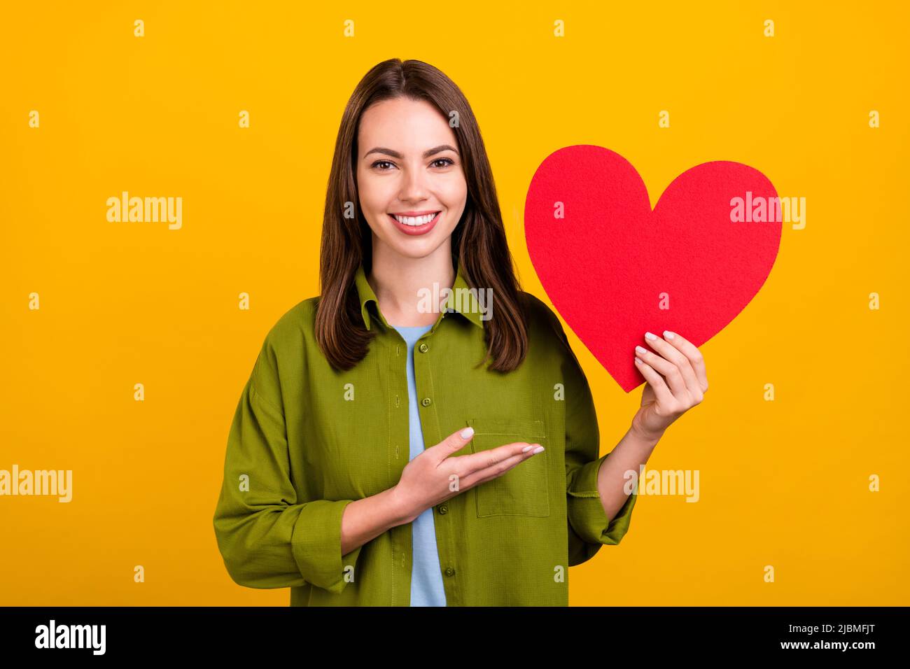 Photo of charming shiny young woman dressed green shirt smiling ...