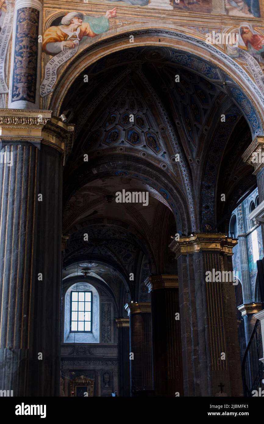 beautiful columns with an arched ceiling and large windows in an old ...