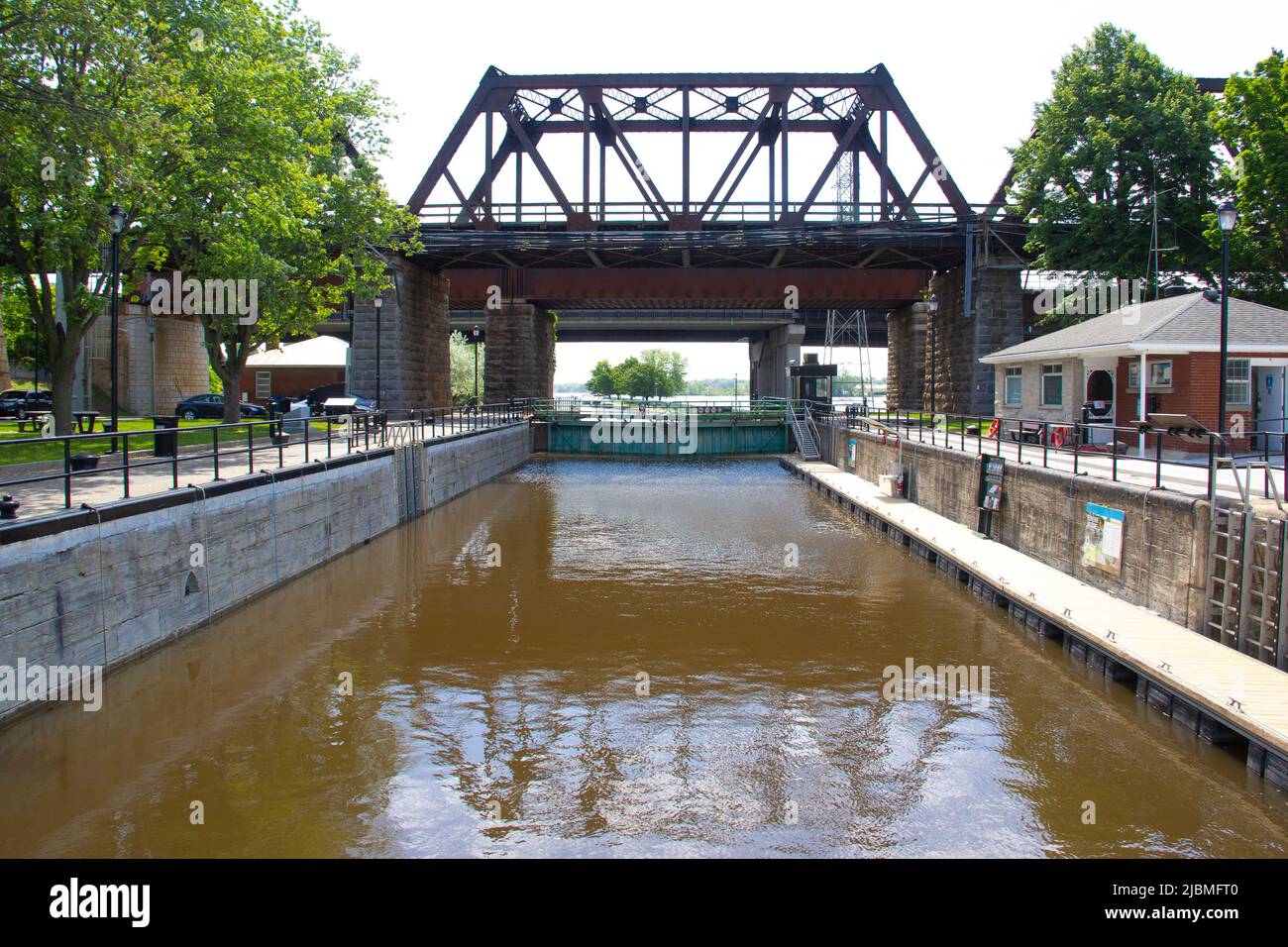 Rail bridge over historic lock Stock Photo - Alamy