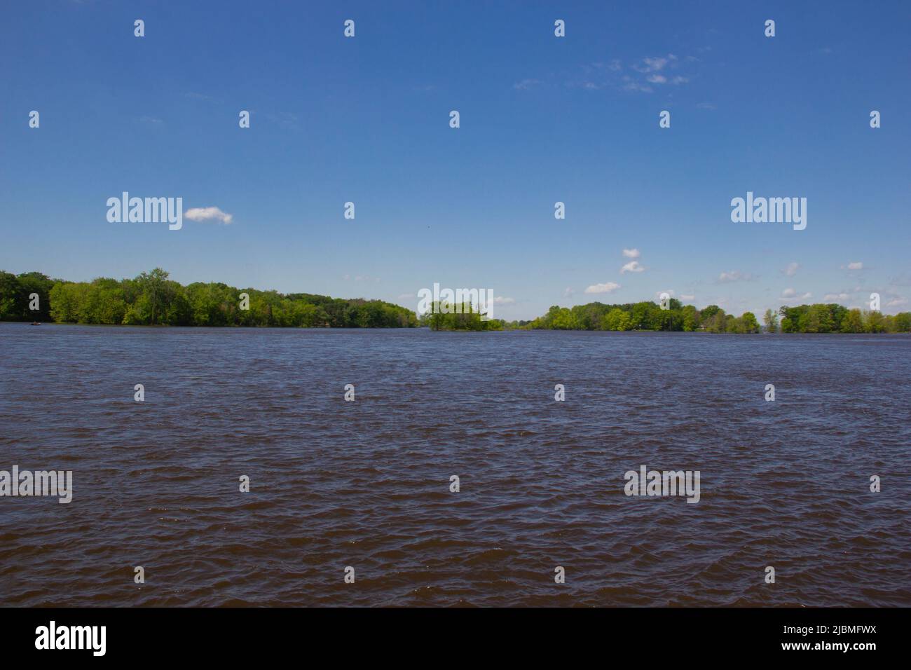Small islands on a lake Stock Photo - Alamy